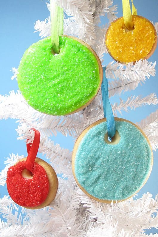 sparkly Christmas ornament cookies simply decorated with sprinkles