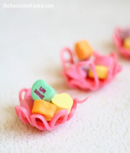Cute mini Valentine's Day candy cups hold sweet treats for your sweet.