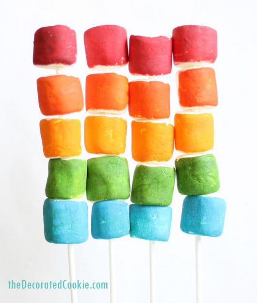 painted rainbow marshmallows, a fun unicorn food idea
