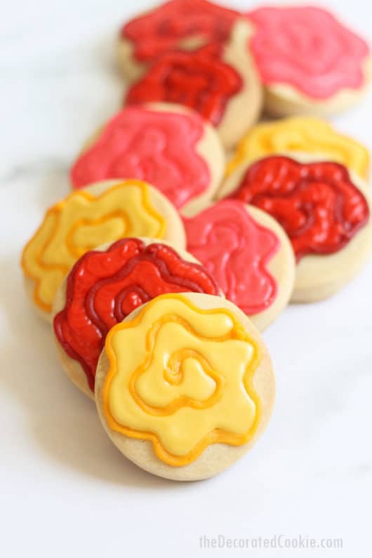 EASY ROSE COOKIES-- royal icing on cut-out circle sugar cookies.