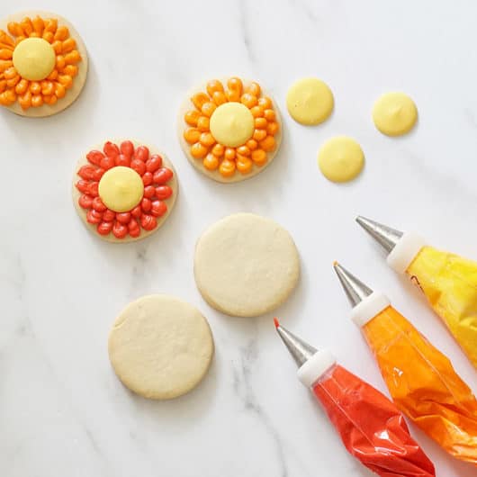PIPED FLOWER COOKIES for FALL -- Sugar cookies with frosting.
